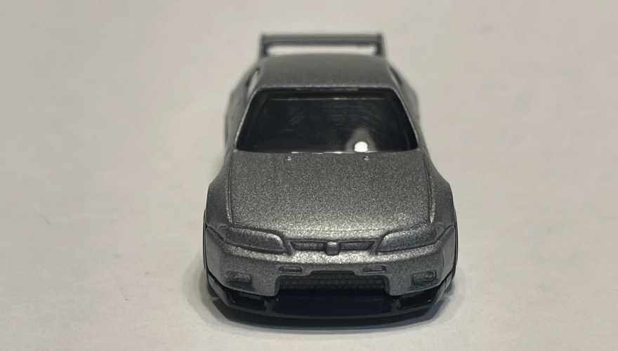Машинка Базова Hot Wheels Nissan Skyline GT-R R33 Godzilla J-Imports 1: ...